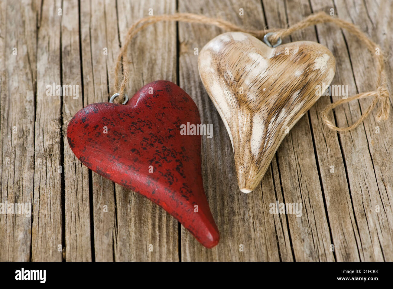 Two hearts on wood Stock Photo - Alamy