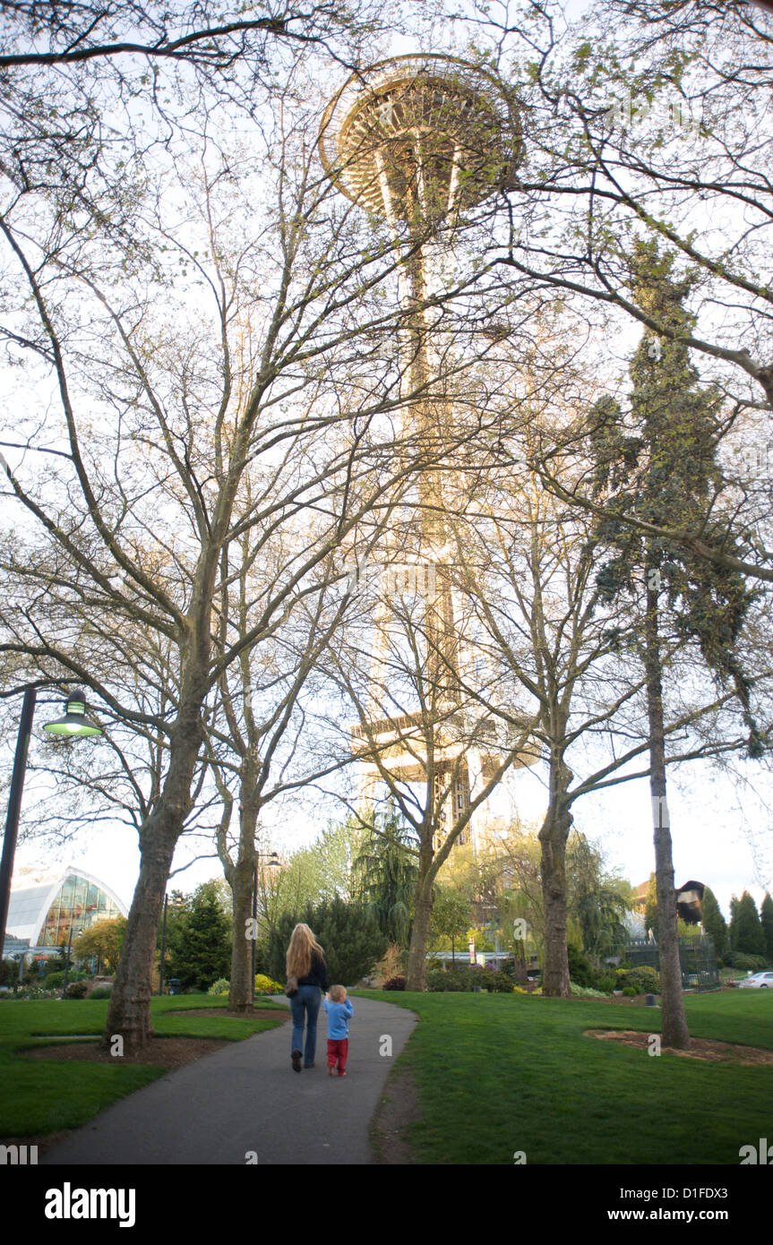 Mother and son walk toward the Space Needle, Seattle, Washington State ...