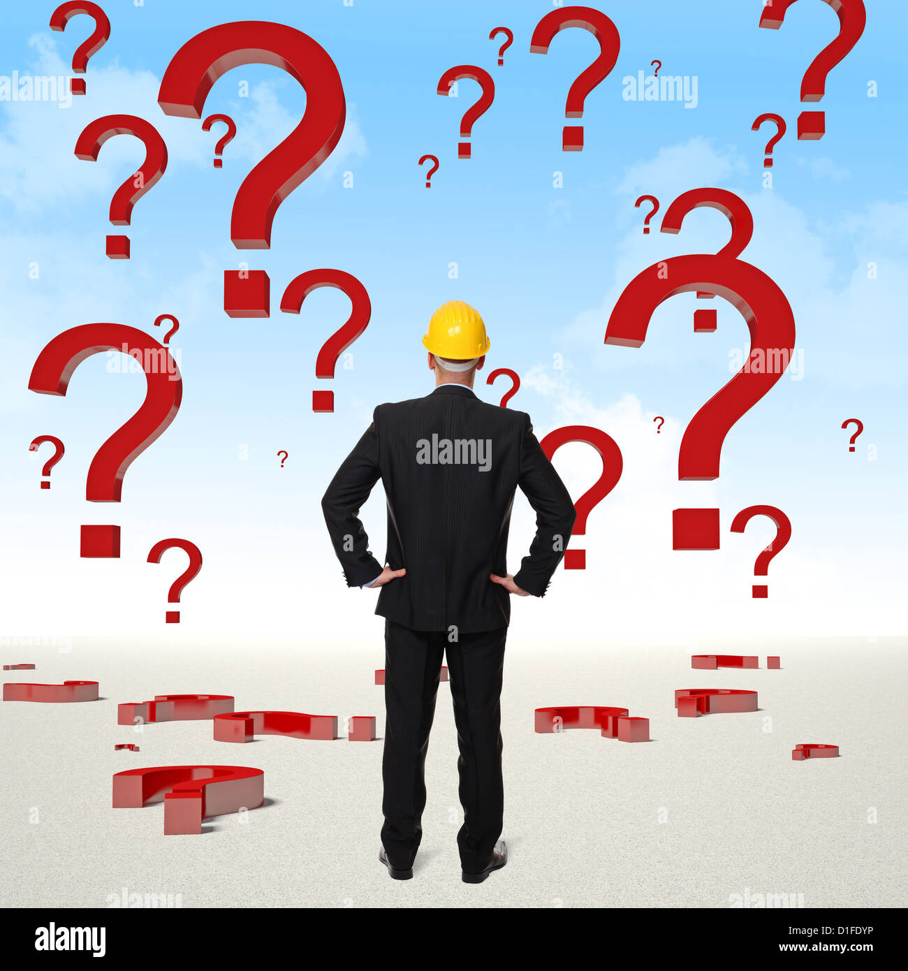 standing engineer and question mark in the sky Stock Photo - Alamy