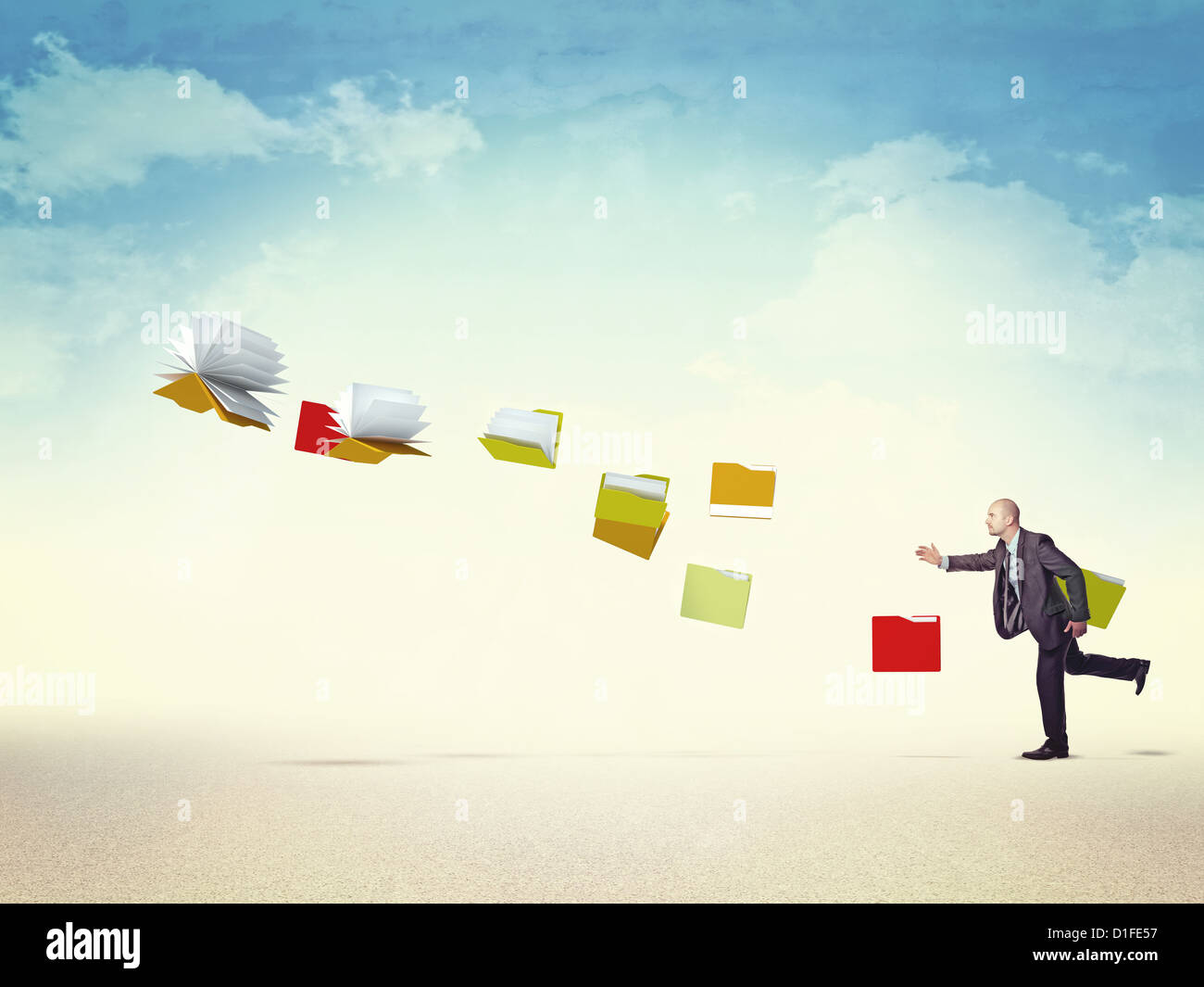 businessman follow flying file and documents Stock Photo - Alamy