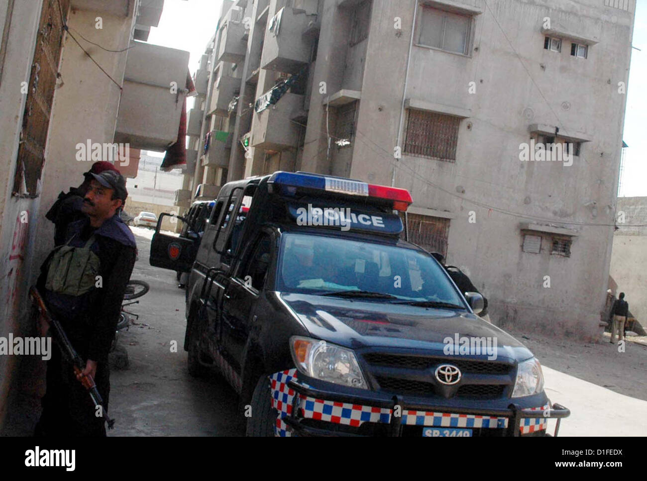 Police commandos take part in an operation against criminals believed ...