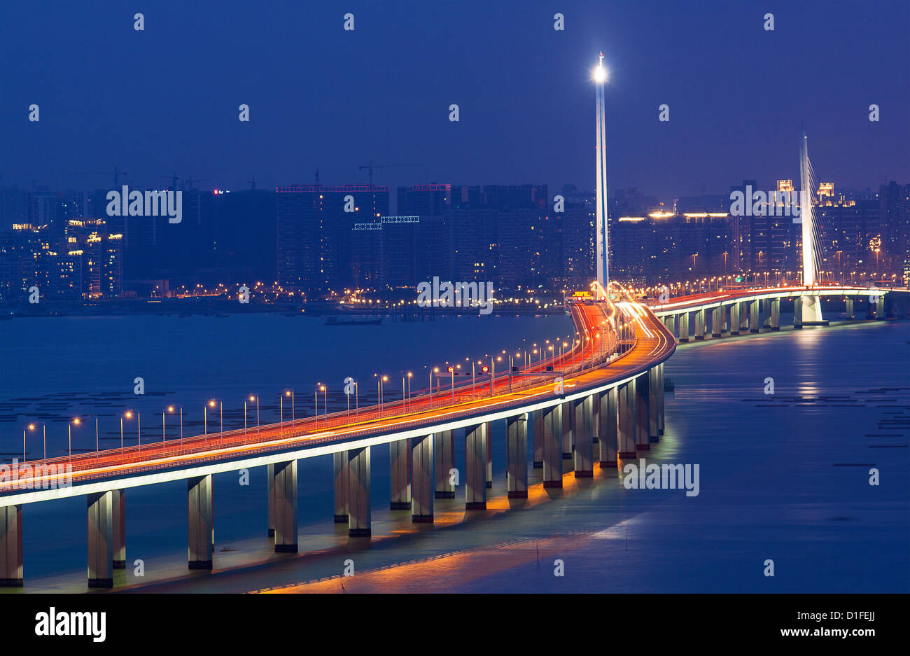 Freeway in night with cars light in modern city Stock Photo - Alamy