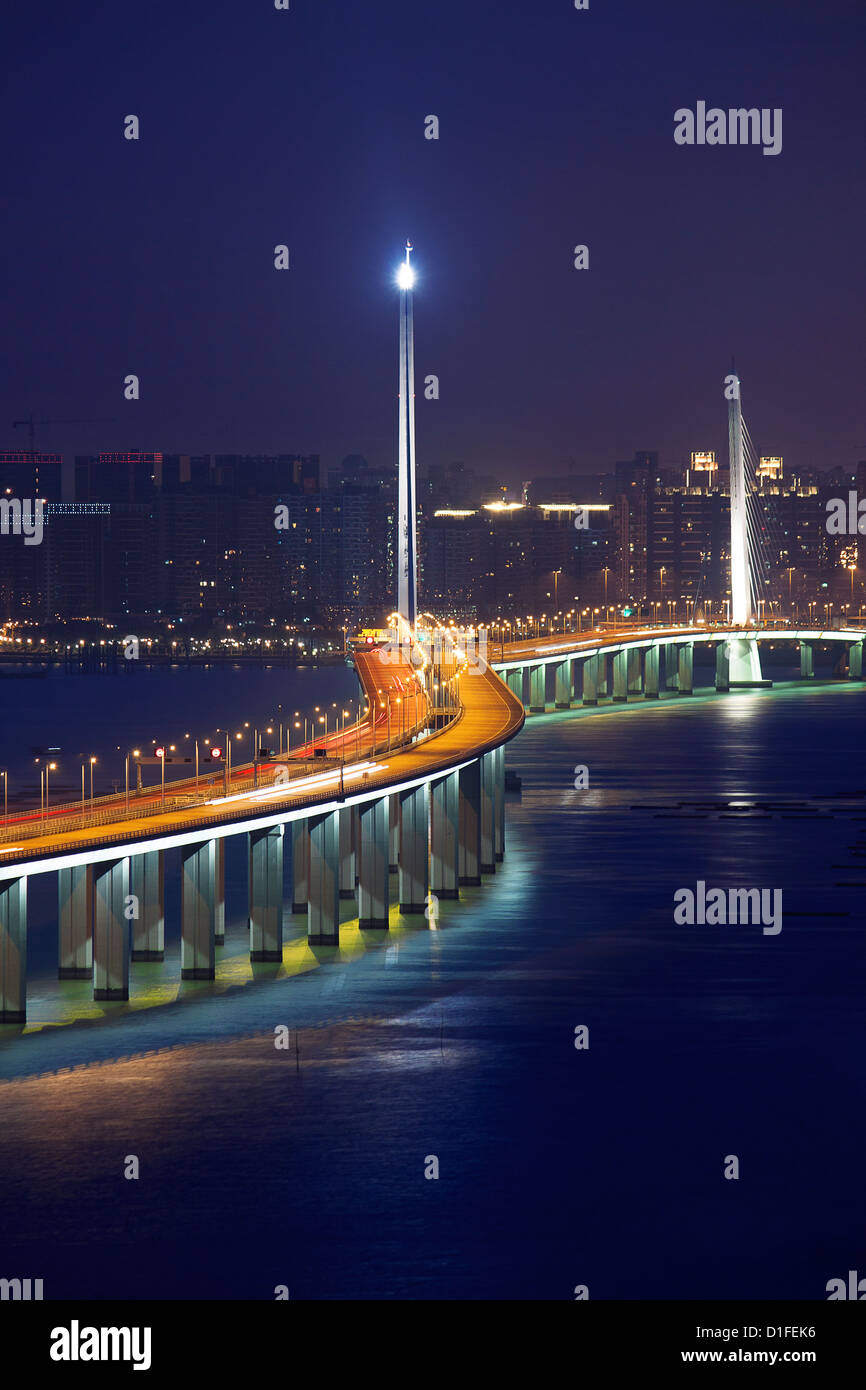 Freeway in night with cars light in modern city Stock Photo - Alamy