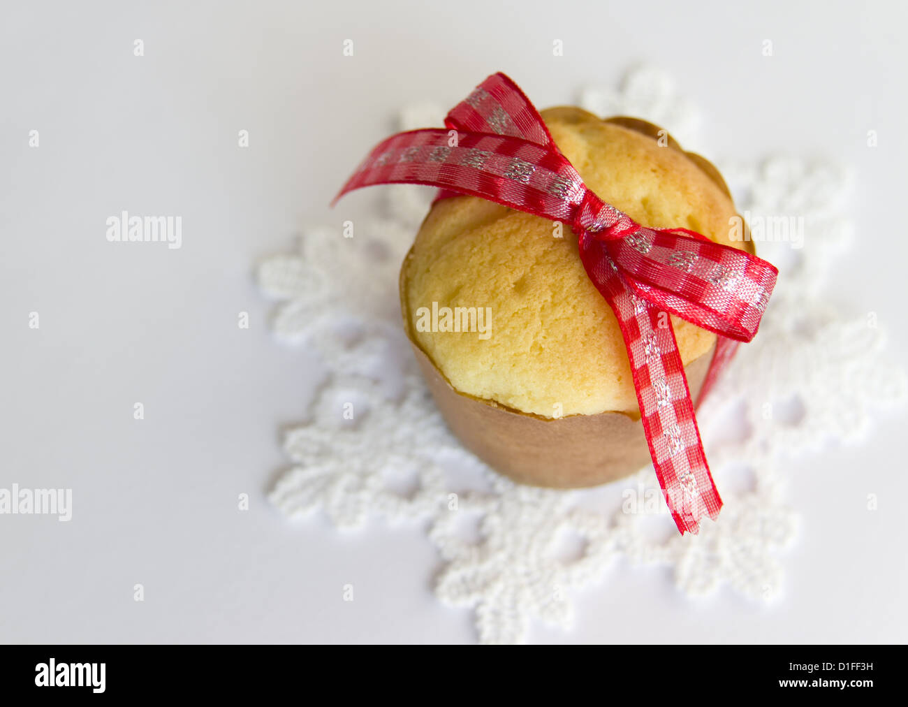 Muffin tied with a ribbon Stock Photo - Alamy