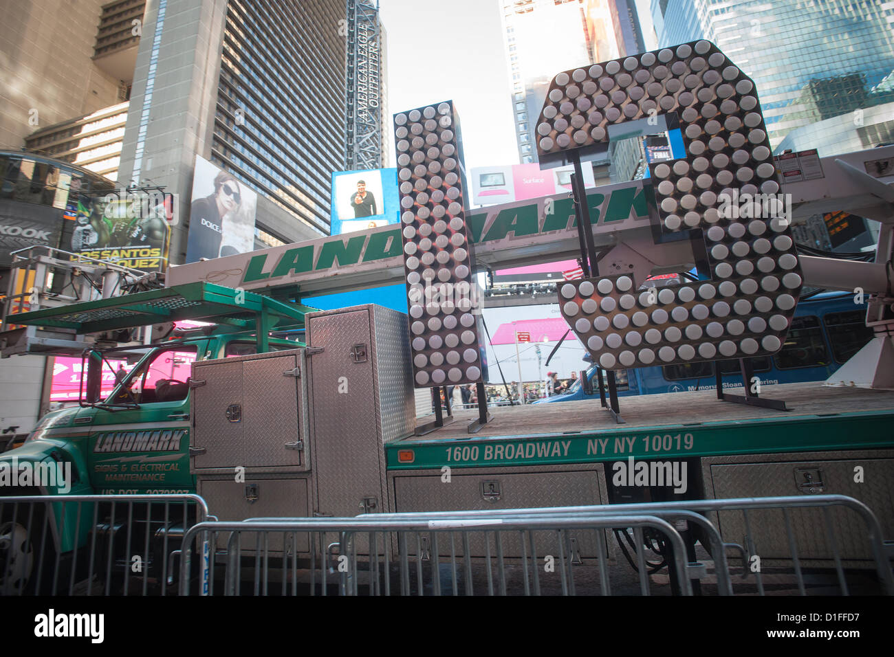 Two seven-foot-tall numerals "1" and "3" arrive at the Times Square ...