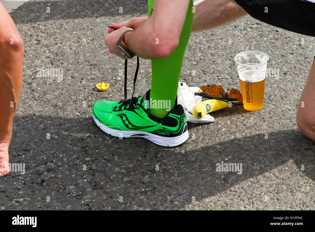 Runners fastening their Shoes just after Finish of the Berlin Half ...