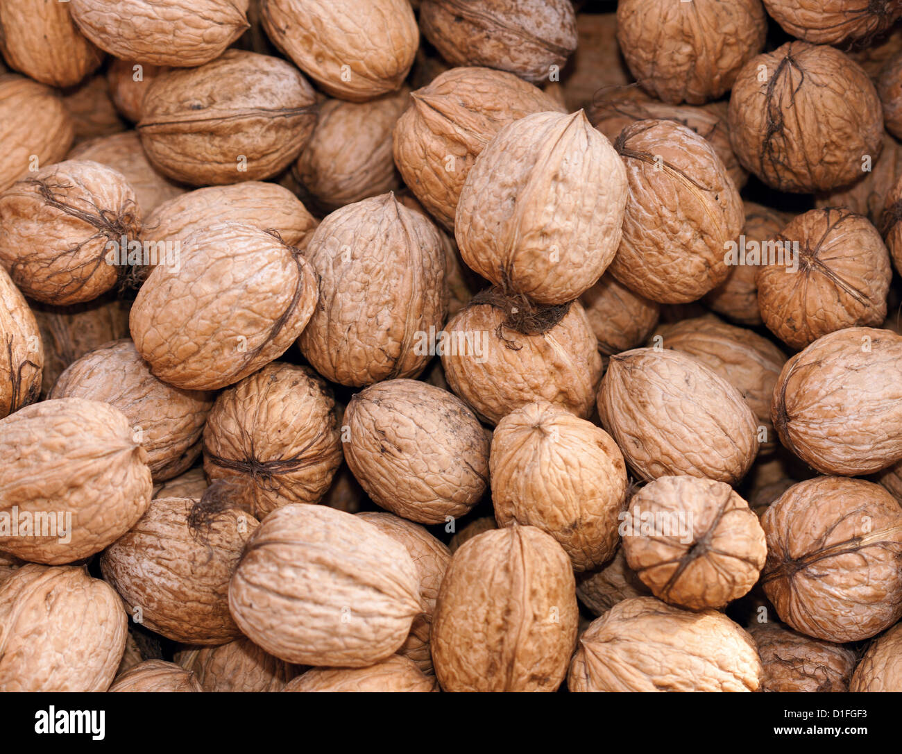 A closeup shot of a greek nuts background Stock Photo - Alamy