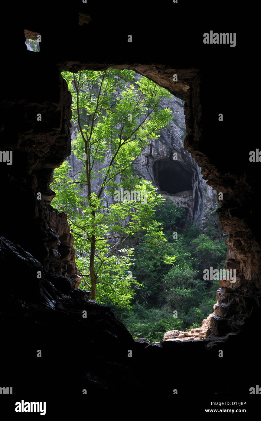 Underground cave entrance silhouette view from inside Stock Photo - Alamy