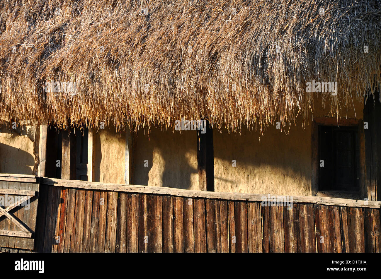 Traditional rural cottage with straw roof Stock Photo - Alamy