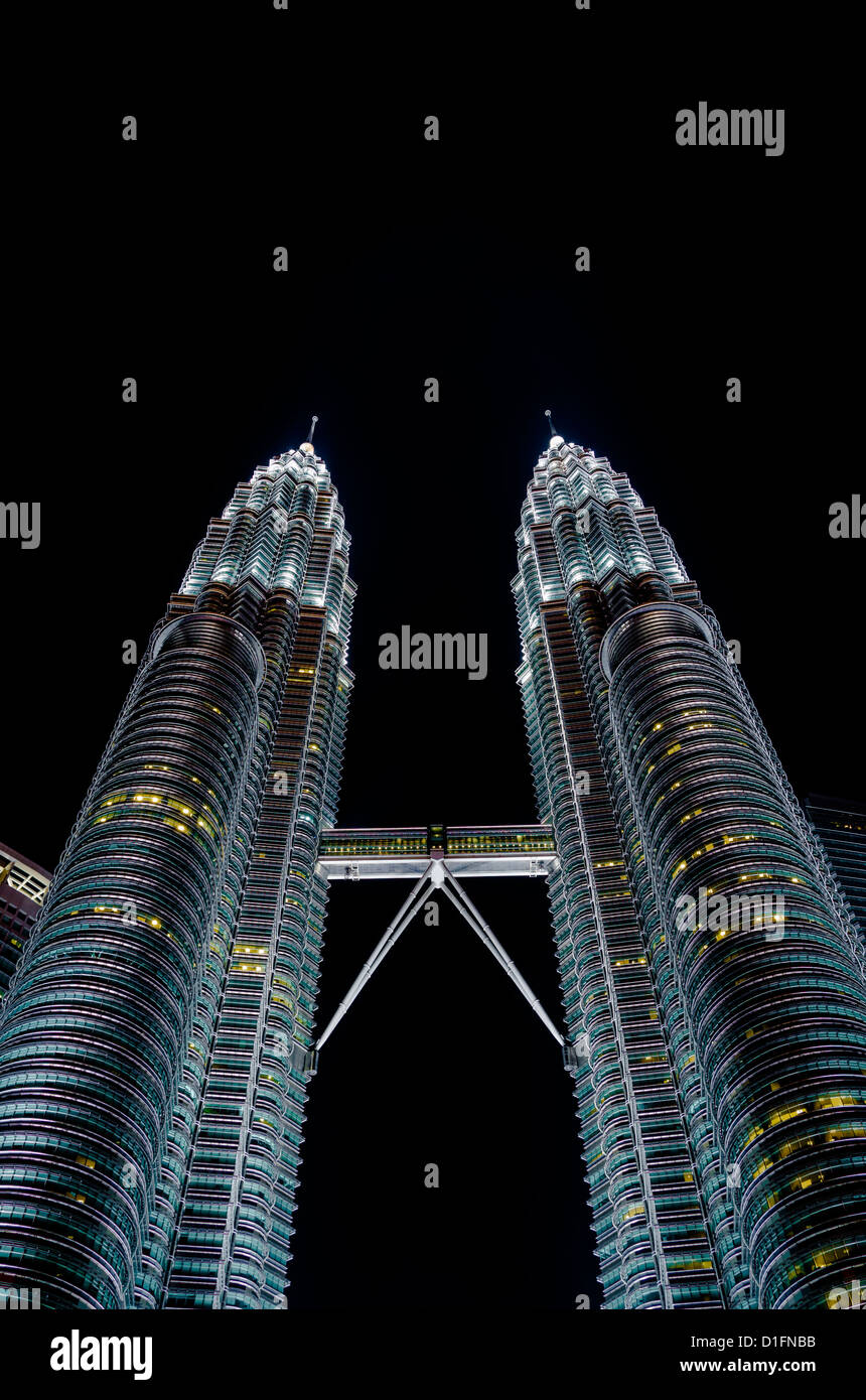 front view of the Petronas Twin Towers in Kuala Lumpur, Malaysia, at ...