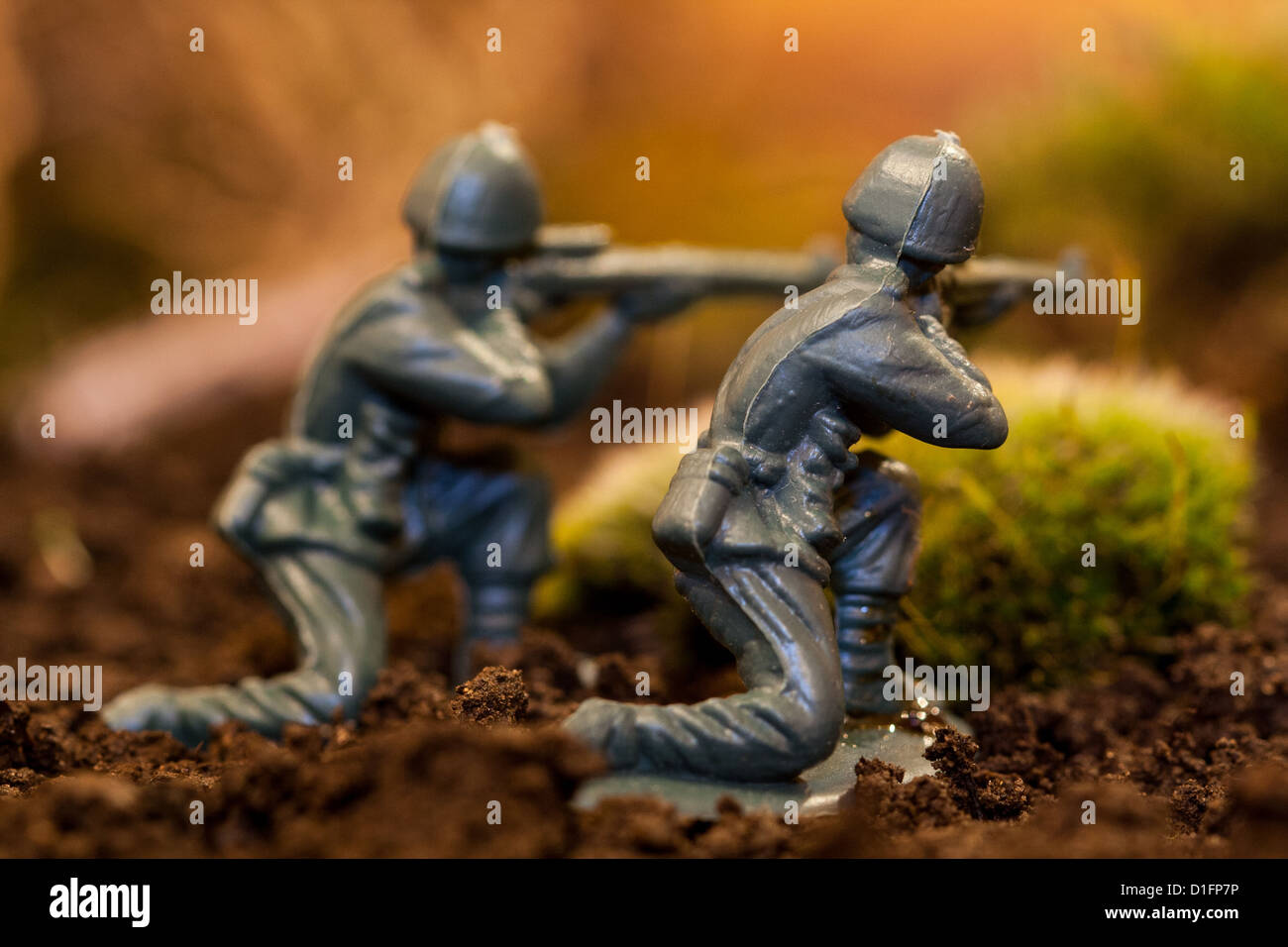 Toy soldiers in battle Stock Photo - Alamy