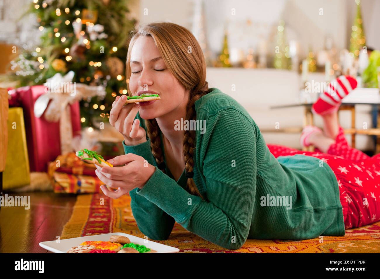 Woman cookie one person eyes closed hi-res stock photography and images ...