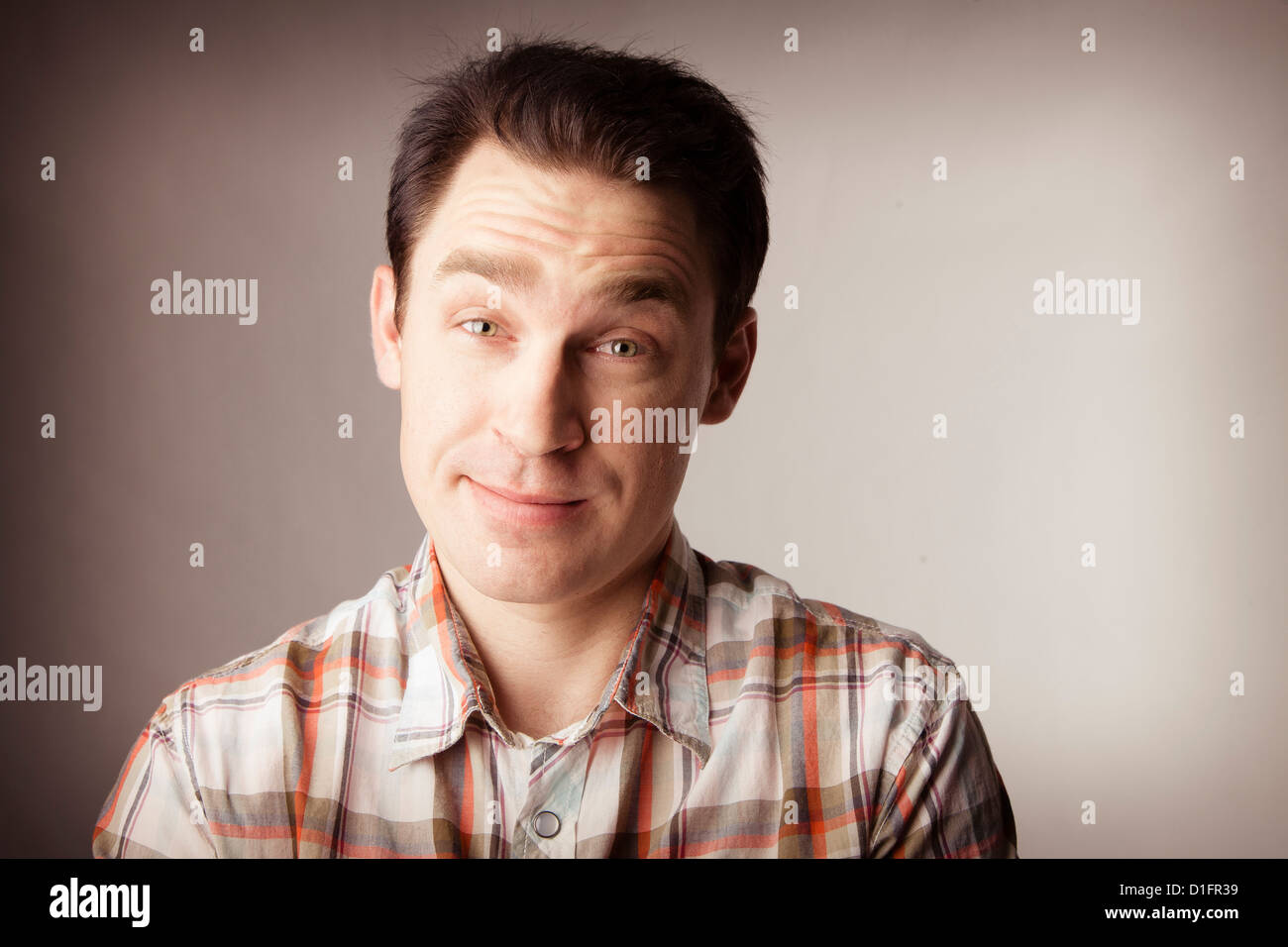 Questioning Caucasian man Stock Photo - Alamy