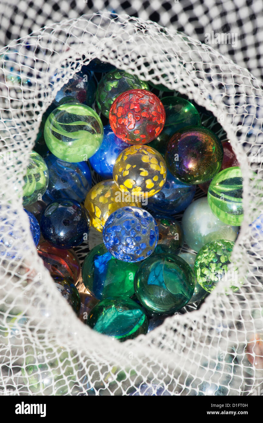 Marbles in a bag Stock Photo - Alamy