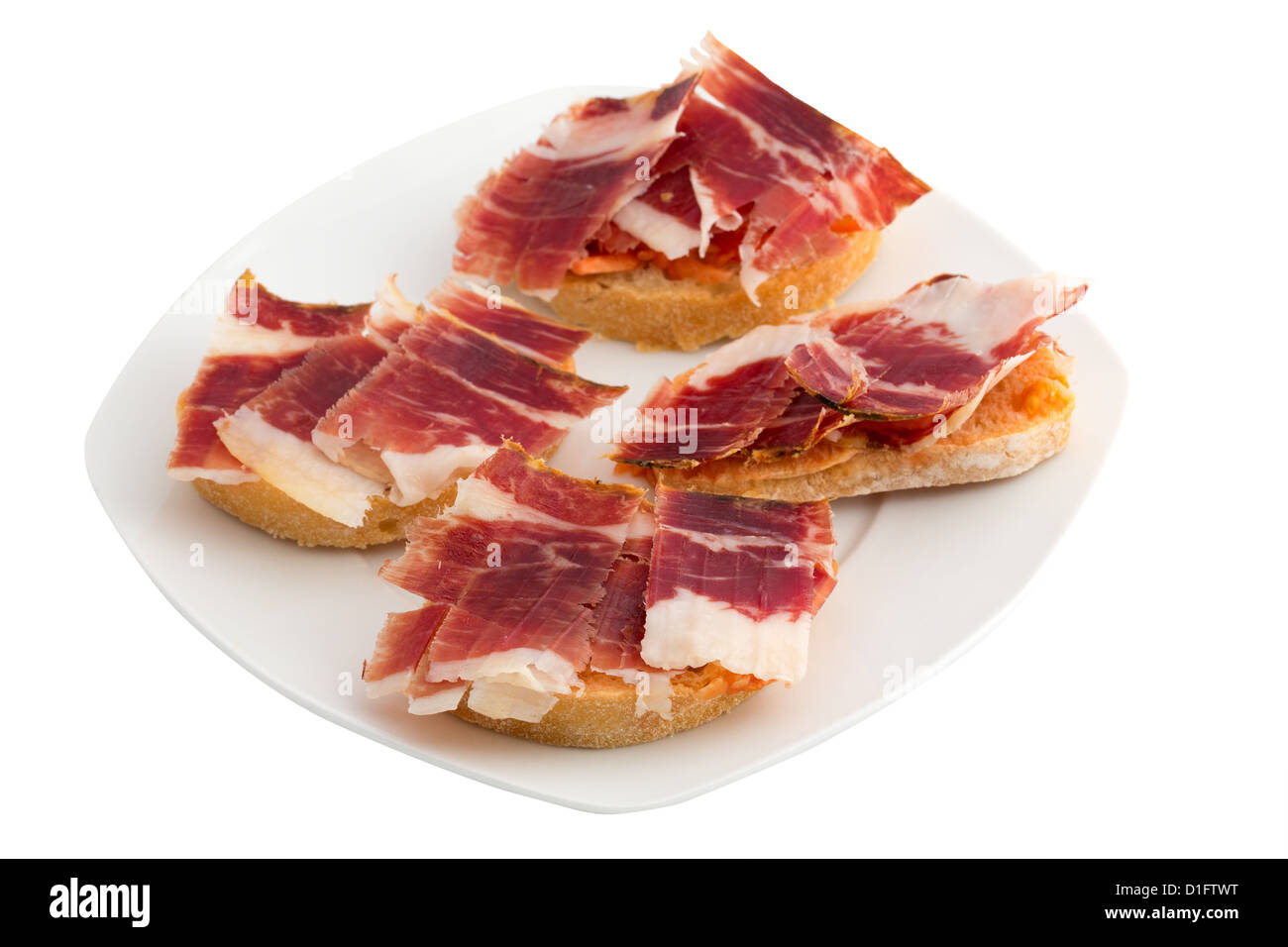 Spanish tapa serrano ham Cut Out Stock Images & Pictures - Alamy