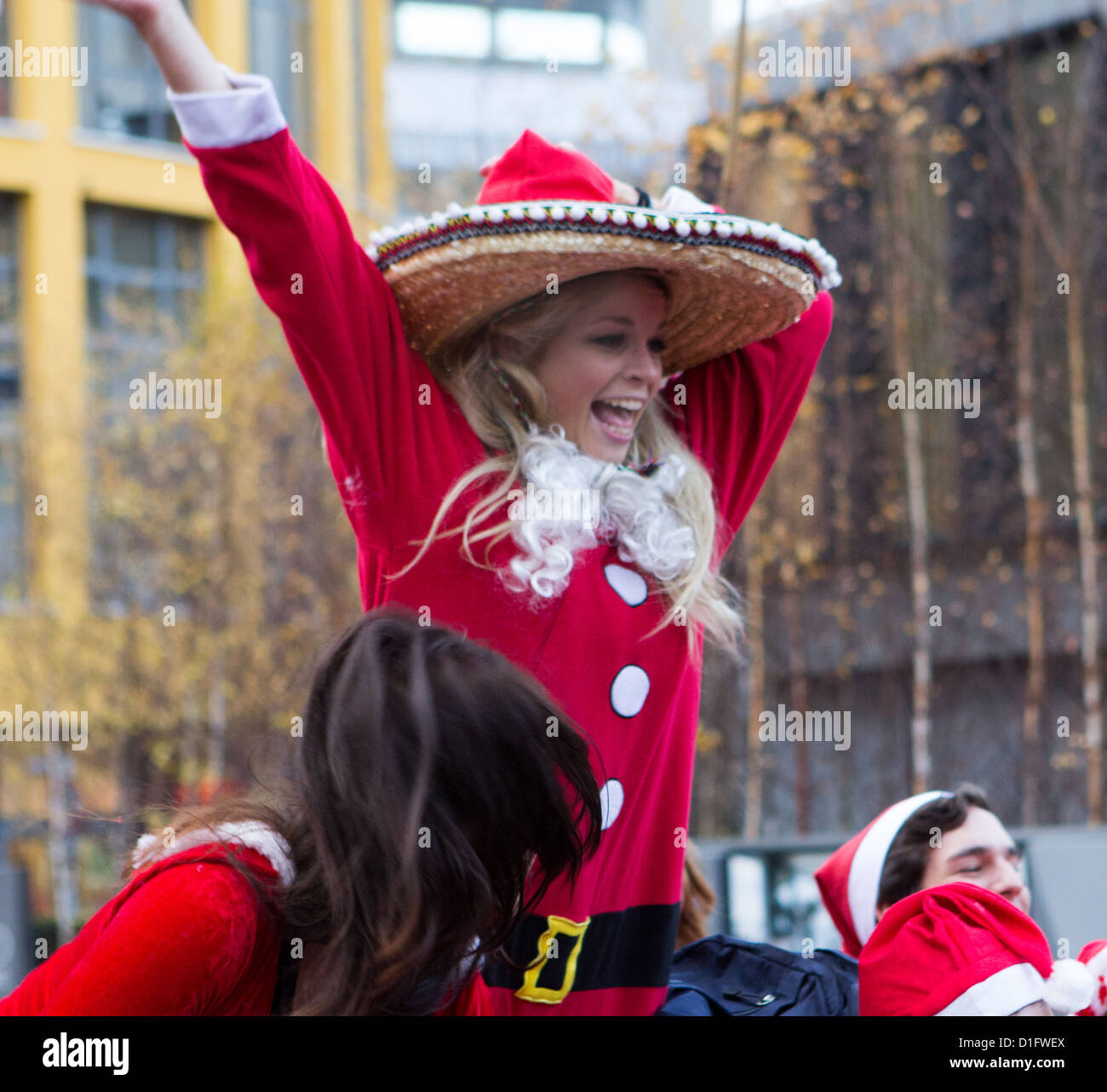 Girl dressed as Santa Claus Stock Photo - Alamy