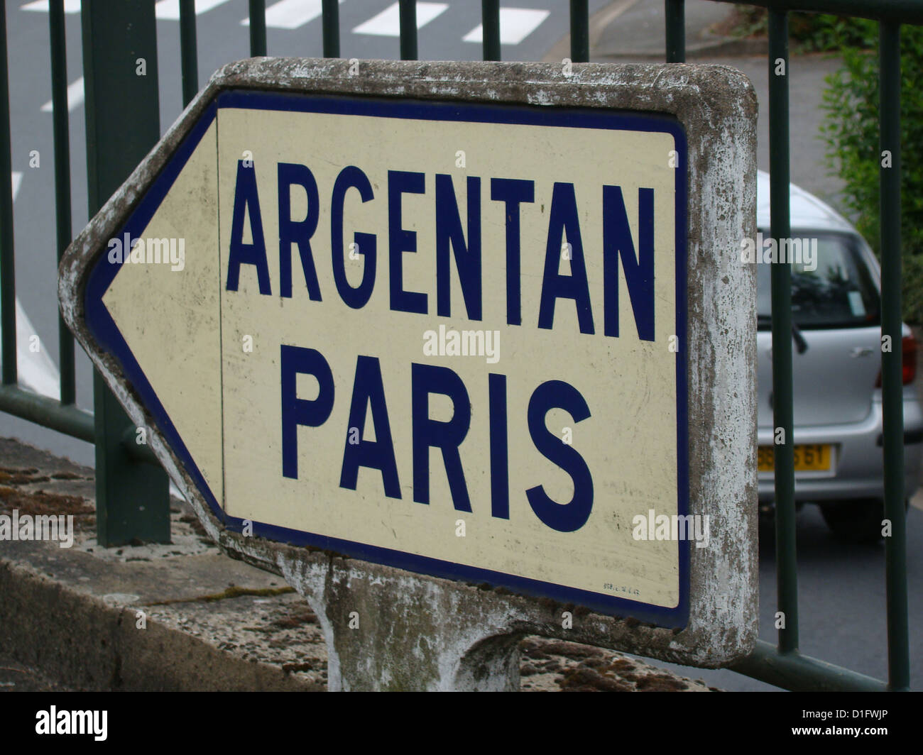 Signpost to Argentan and Paris, La Ferte Mace, France Stock Photo - Alamy