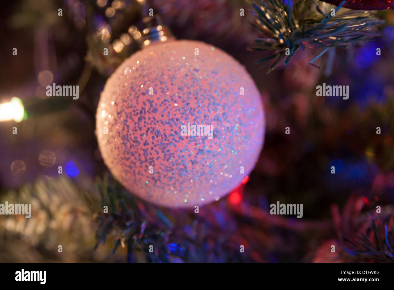White Christmas Bauble with red and blue tint landscape Stock Photo - Alamy