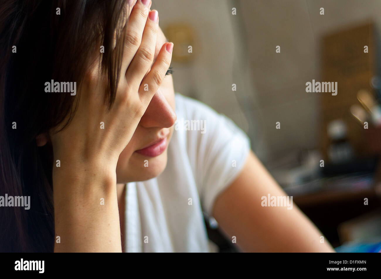 An image of girl with headache Stock Photo - Alamy
