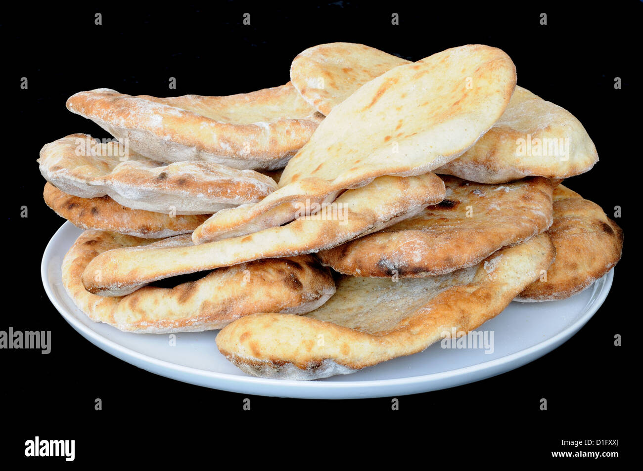 Freshly cooked coriander and garlic Naan bread Stock Photo - Alamy