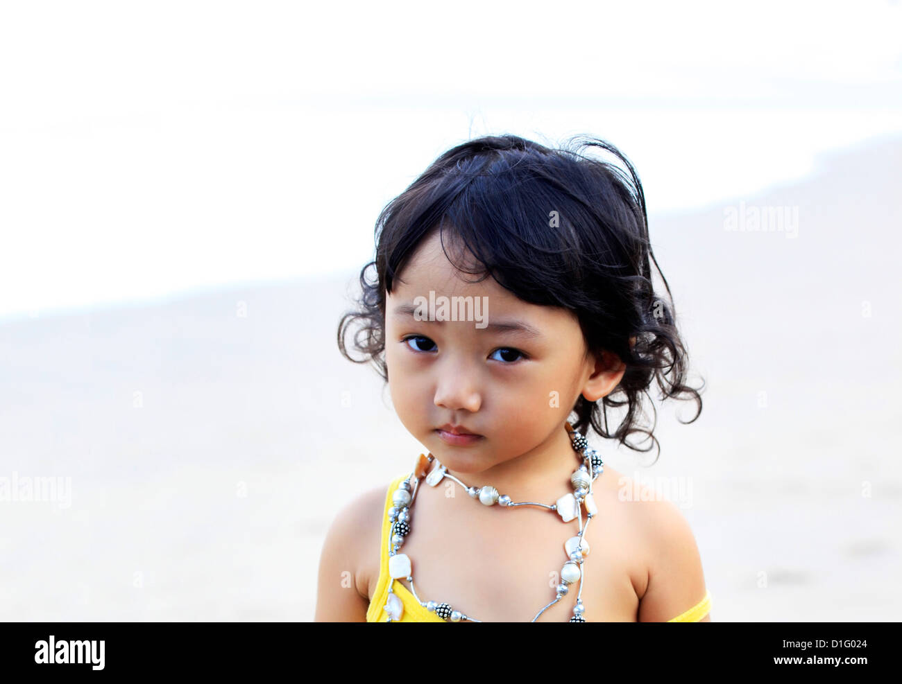 Portrait of the beautiful small Asian girl. Indonesia. Java Stock Photo ...