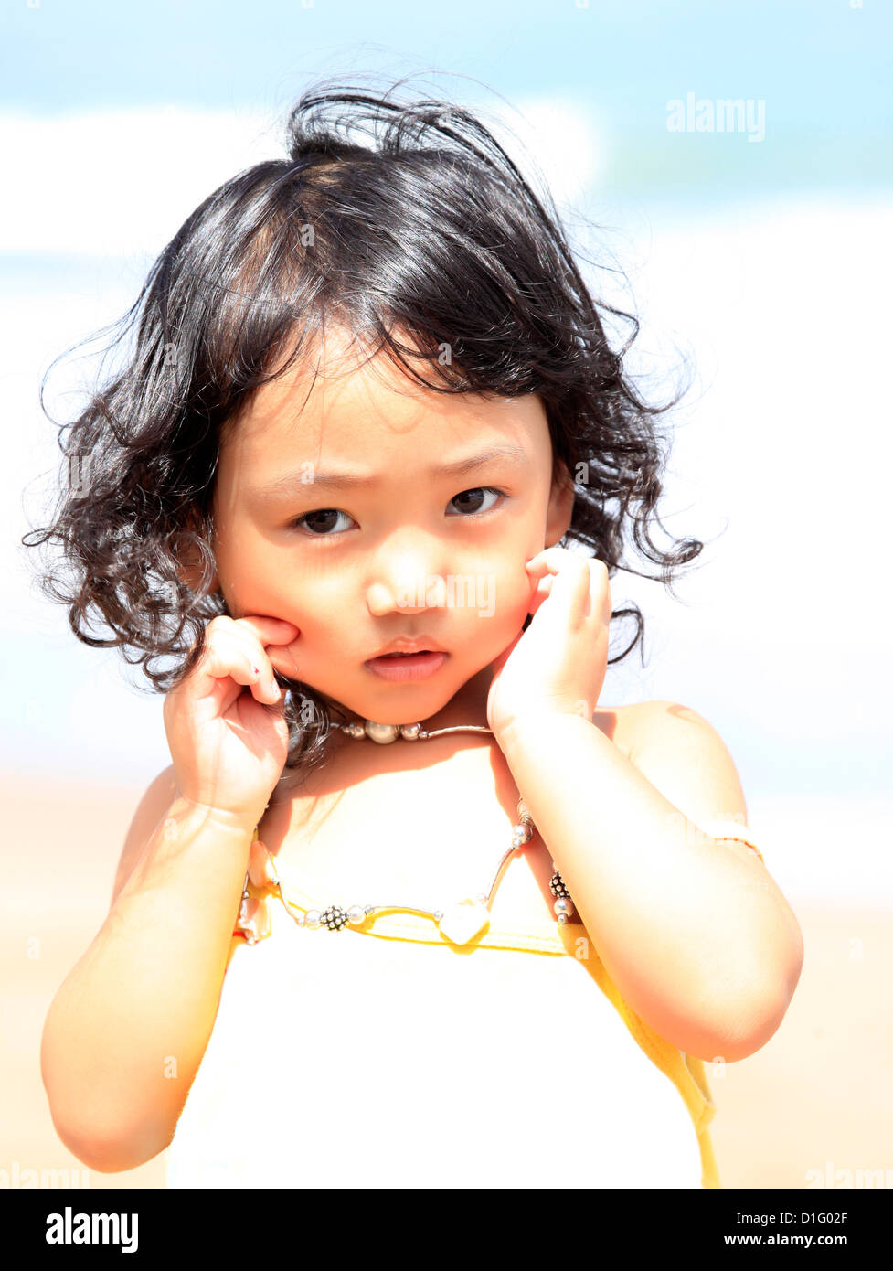 Portrait of the beautiful small Asian girl. Indonesia. Java Stock Photo ...
