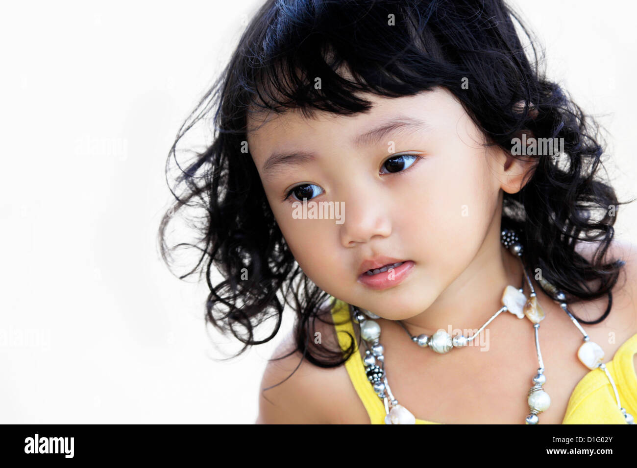 Portrait of the beautiful small Asian girl. Indonesia. Java Stock Photo ...