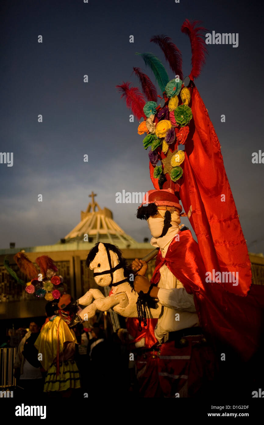 A pilgrim dressed as Saint James apostle performs outside of the Our ...
