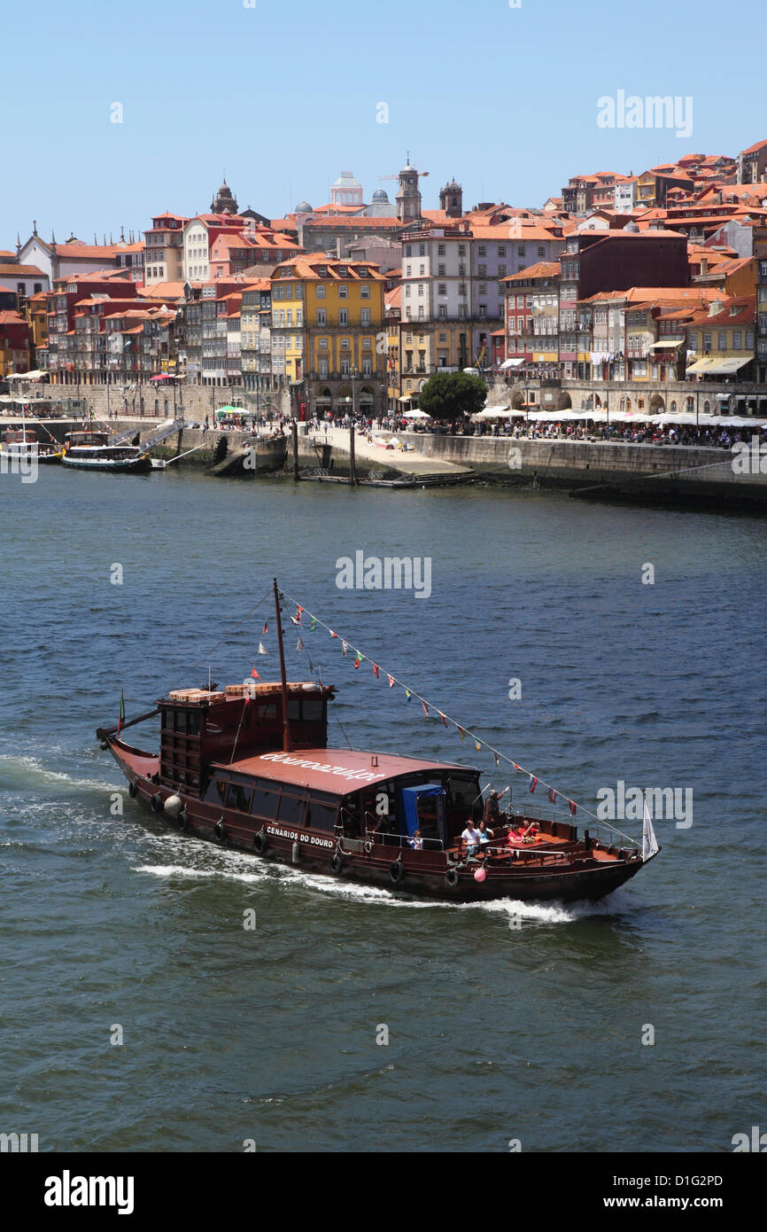 A traditional Rabelo boat, once used for shipping wine grapes, cruises ...