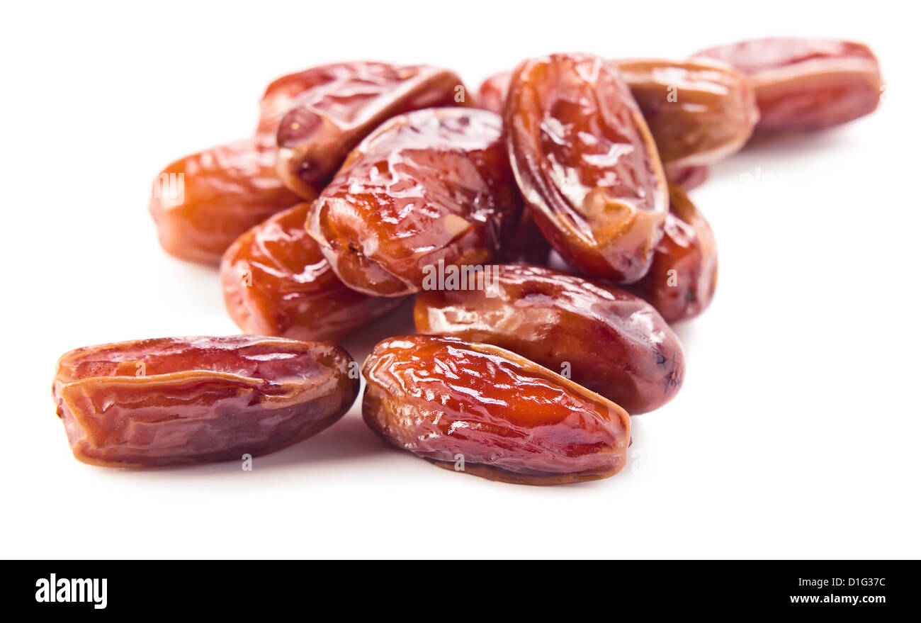 Dried dates isolated on a white background Stock Photo - Alamy