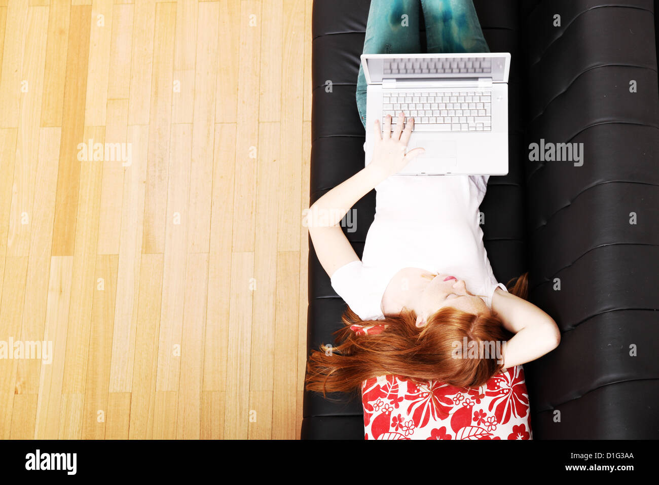 A young woman surfing on the Internet with a Laptop Stock Photo - Alamy