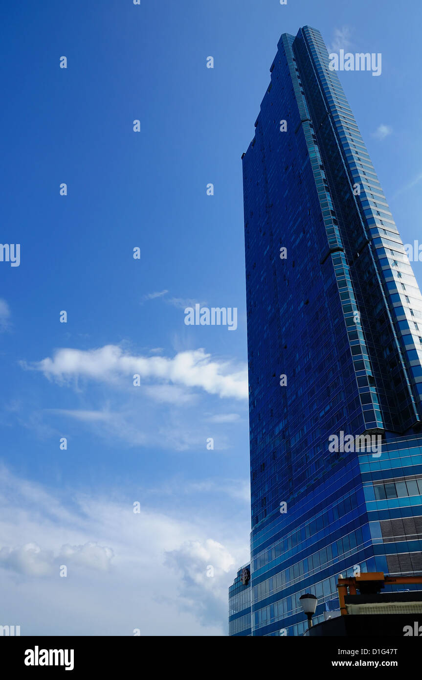 High rise building with blue sky and some cloud Stock Photo - Alamy