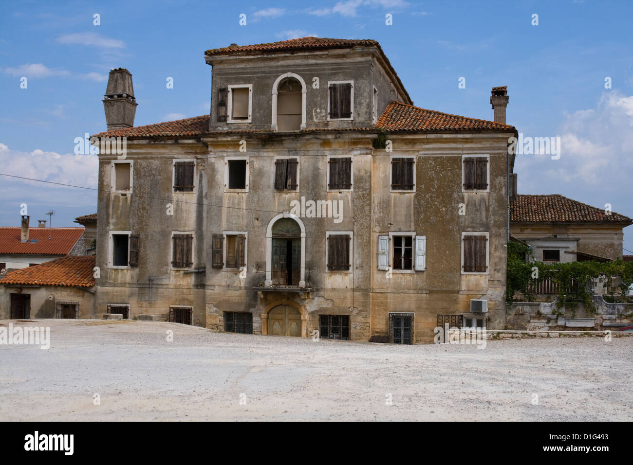 Facade of an old mediterranean italian style derelict house with tile ...
