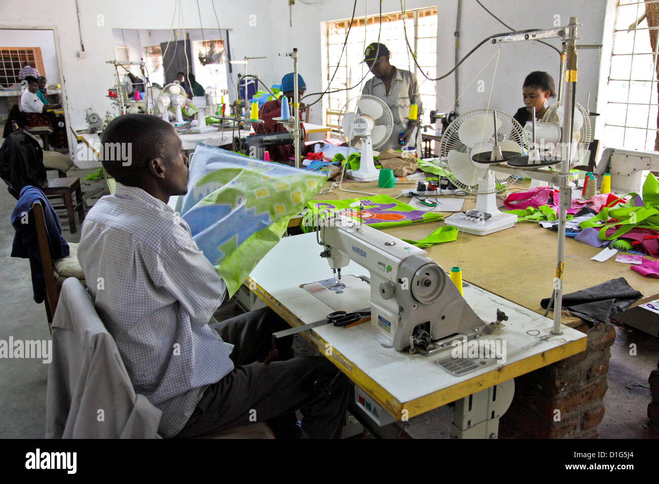 people at work in zambia fabric factory Stock Photo - Alamy