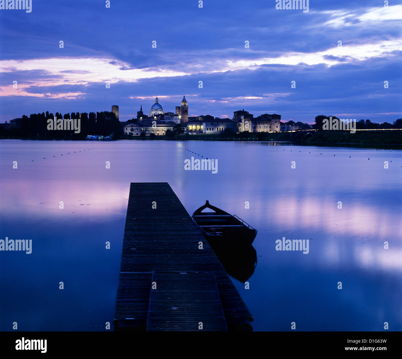 Dusk over the old town and Lake Inferiore, Mantua, Lombardy, Italy ...