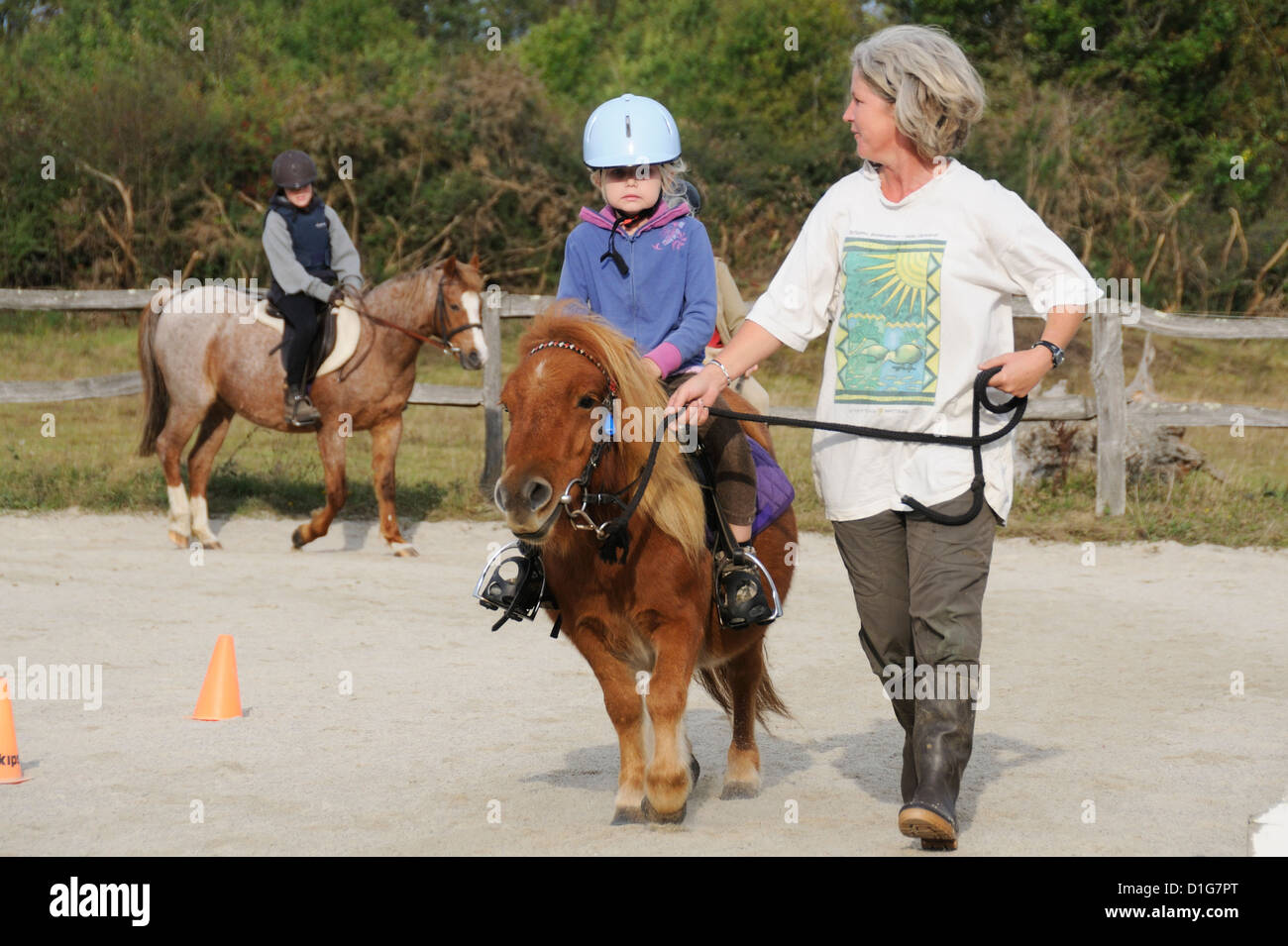 Pony lesson boy ride hi-res stock photography and images - Alamy