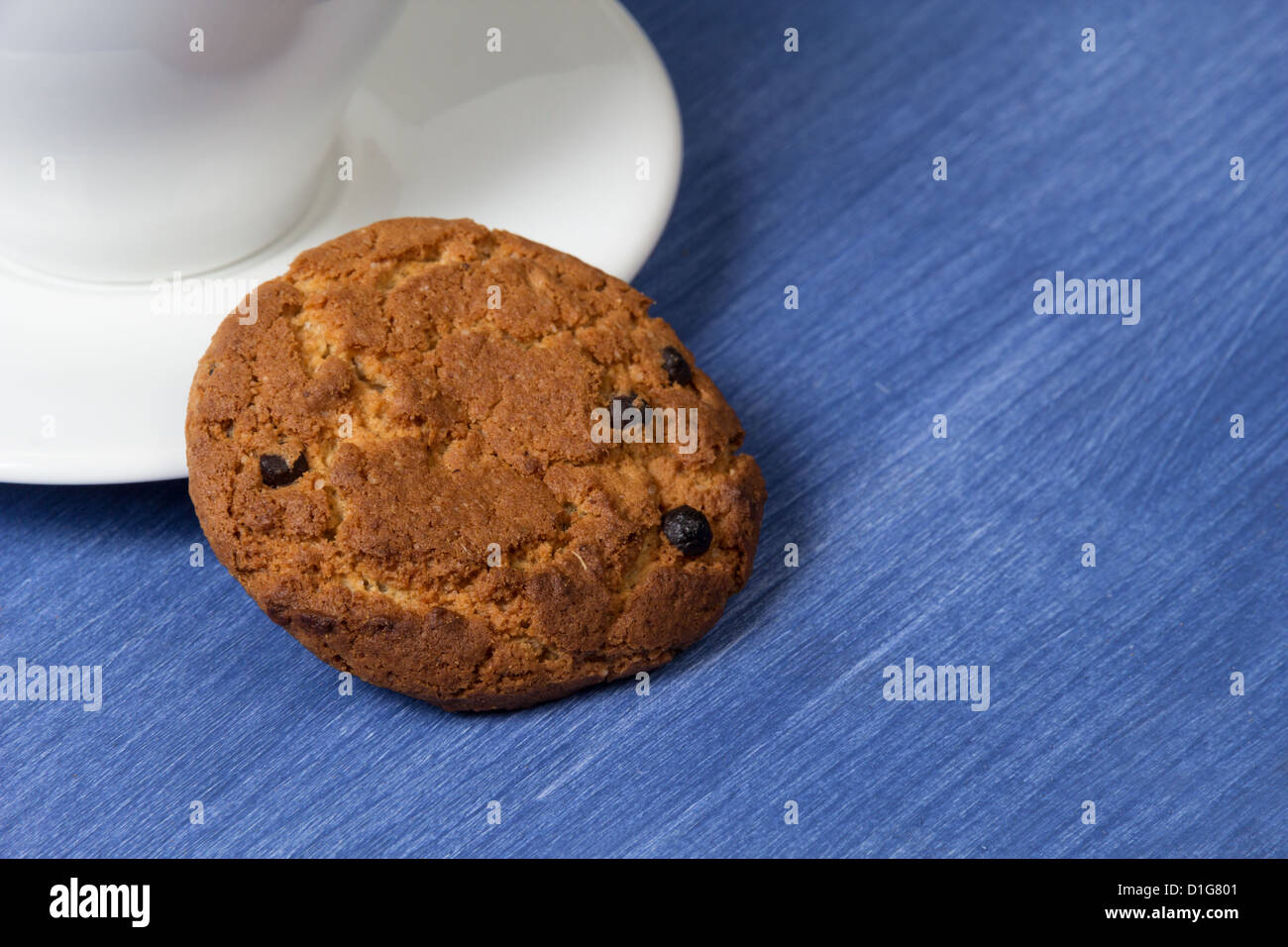 cookies with chocolate pieces and cup isolated Stock Photo - Alamy