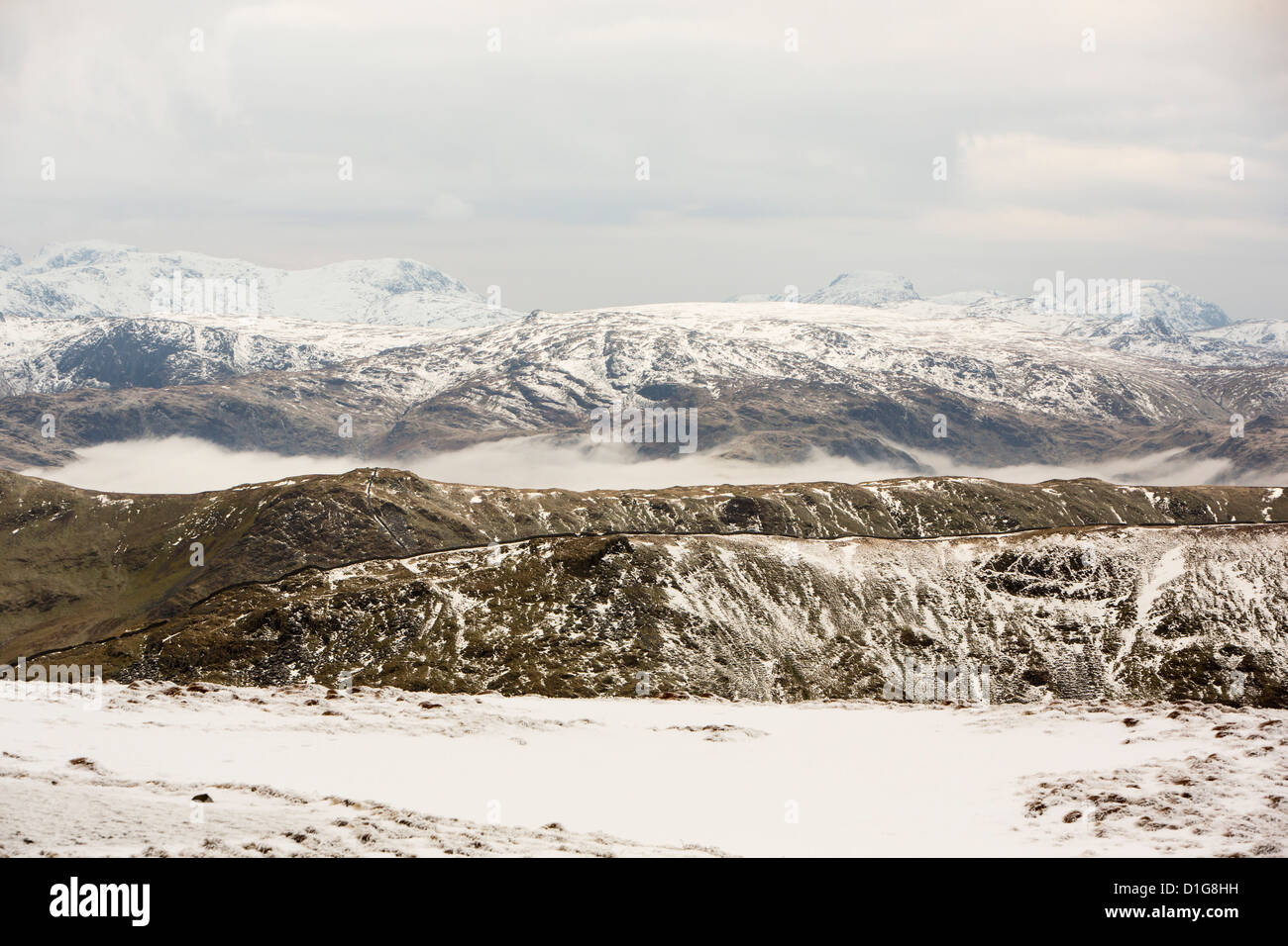 Red Screes above Ambleside with mist from a temperature inversion, Lake ...