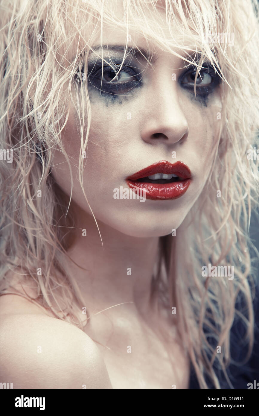 Blond lady with strange makeup. Vertical photo Stock Photo - Alamy
