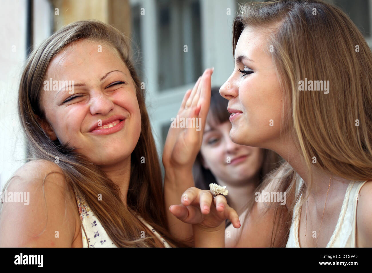 Students girls having conversation and laughing Stock Photo - Alamy