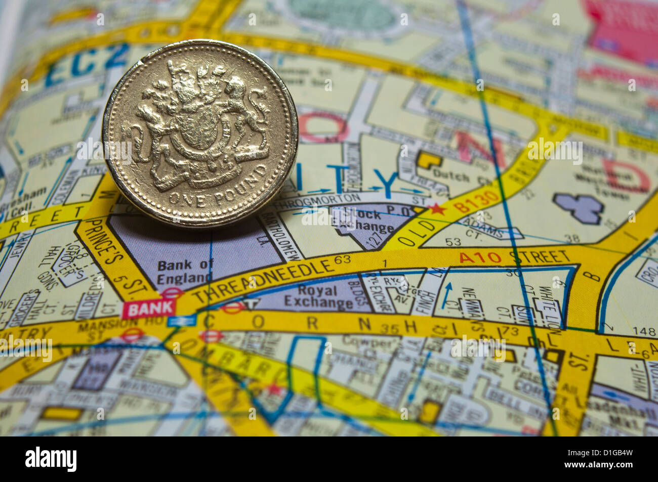 English pound coin on map Stock Photo - Alamy