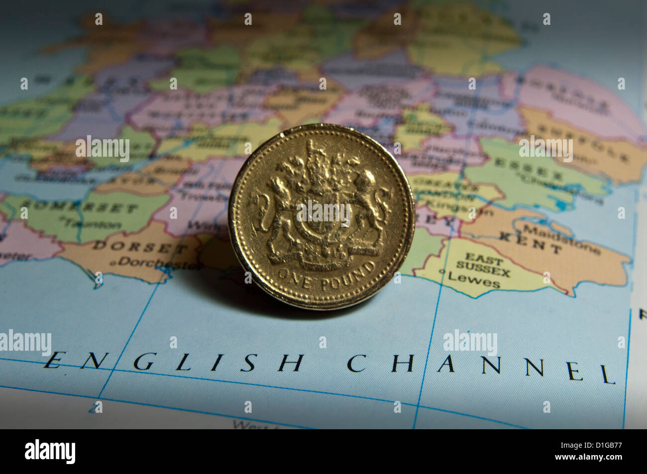 English pound coin on map Stock Photo - Alamy