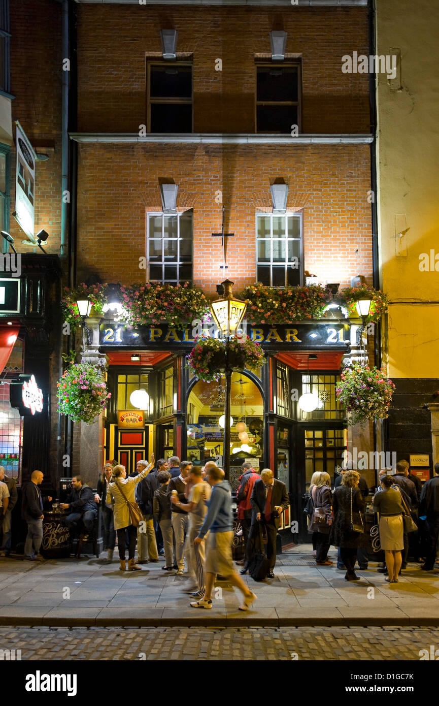 Vertical view of the bustling outside of the Palace Bar during the ...