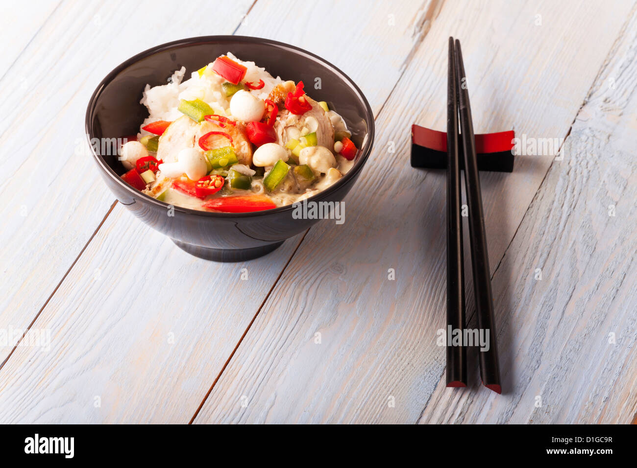 green thai curry with chicken in a bowl Stock Photo - Alamy