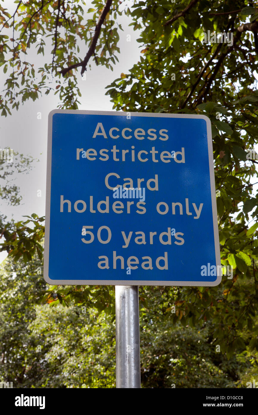 Access restricted card holders only sign Stock Photo - Alamy