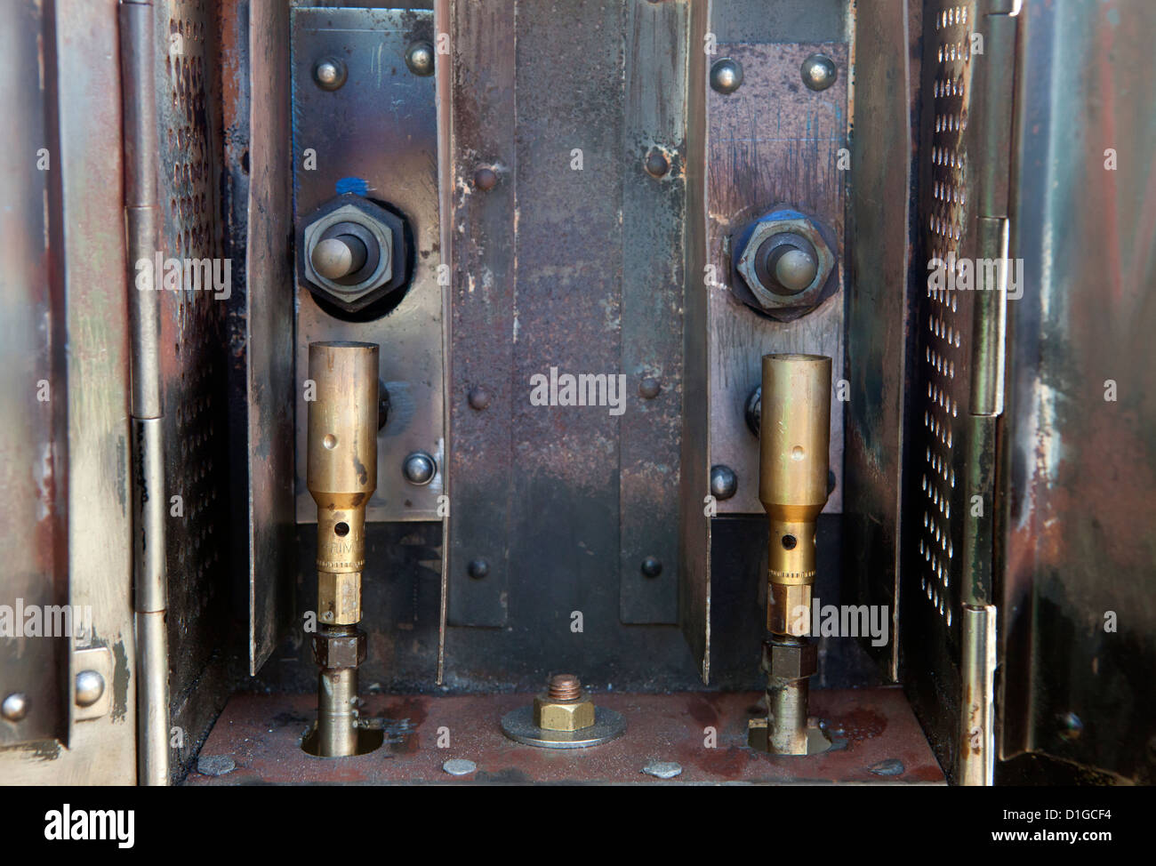 Burners from a hot tube ignition system on a veteran car Stock Photo ...