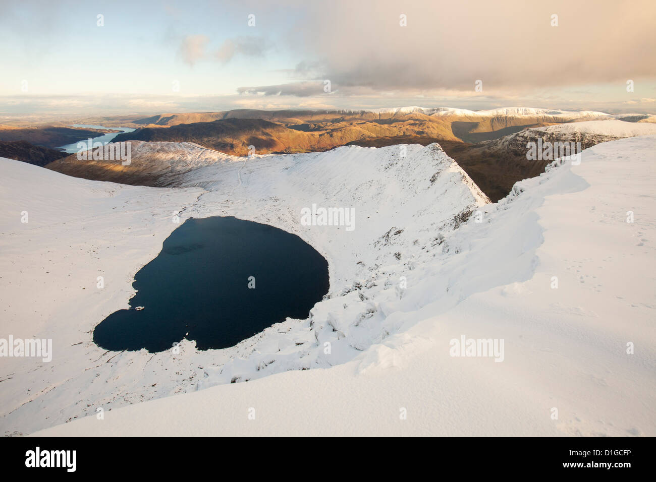 The summit plateau of Helvellyn looking down towards Red Tarn and ...