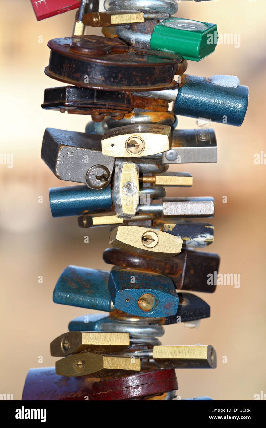 group of various padlock locked on stick Stock Photo - Alamy