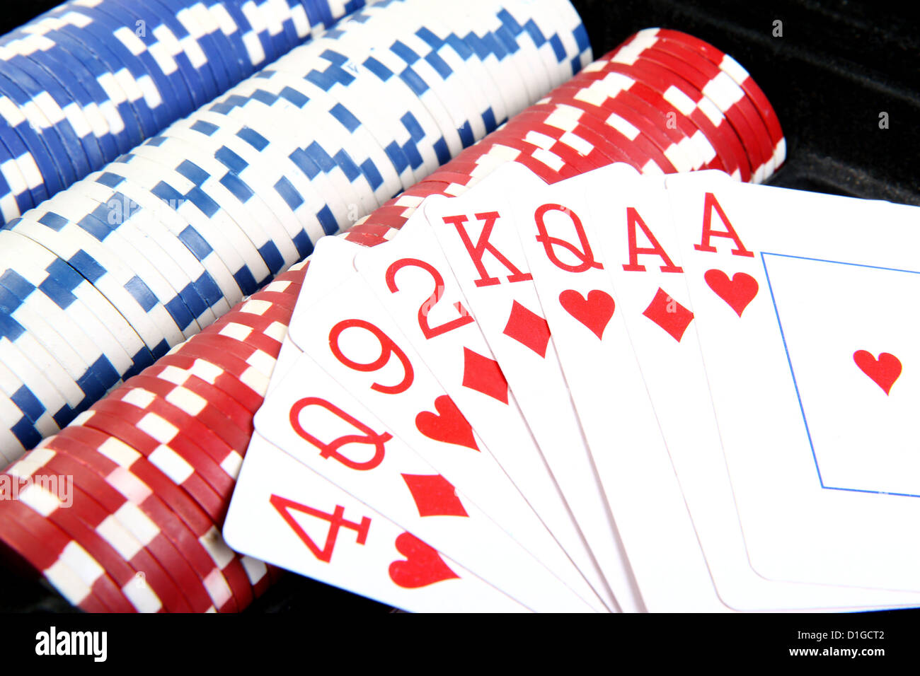 red poker cards and different colour of chips Stock Photo - Alamy