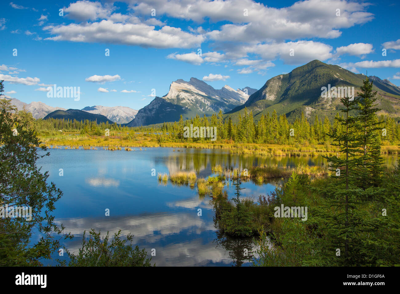Mount Rundle and Sulphur Mountain reflecting in Vermillion Lakes in ...